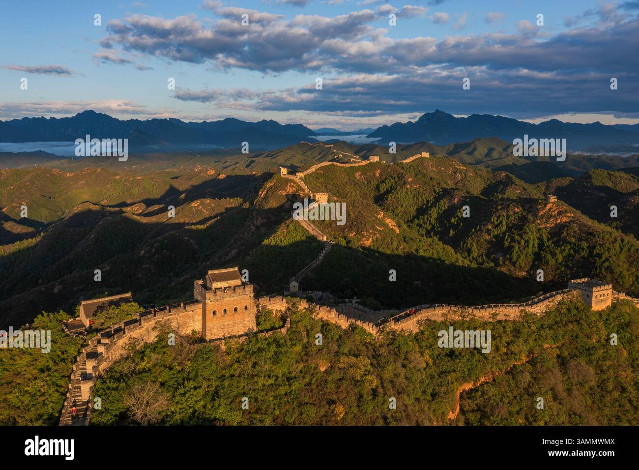 Aerial view of jinshanling great wall surrounded by majestic mountains ...