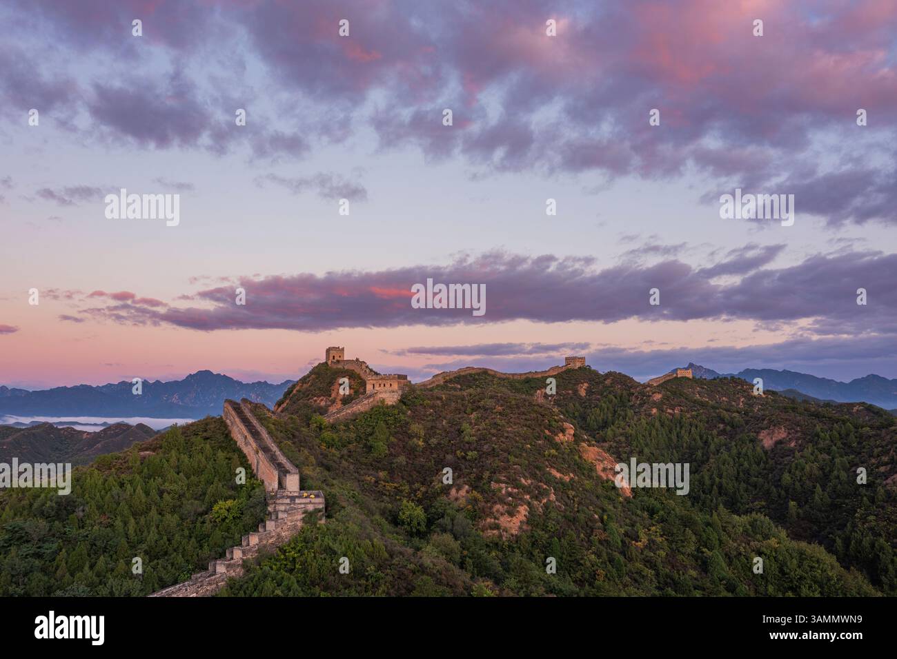 Aerial view of jinshanling great wall amidst majestic mountains and ...