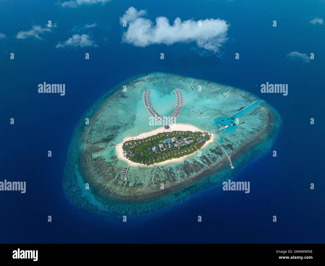 Aerial View Of Kuredhivaru Island With Luxury Resort And Beautiful