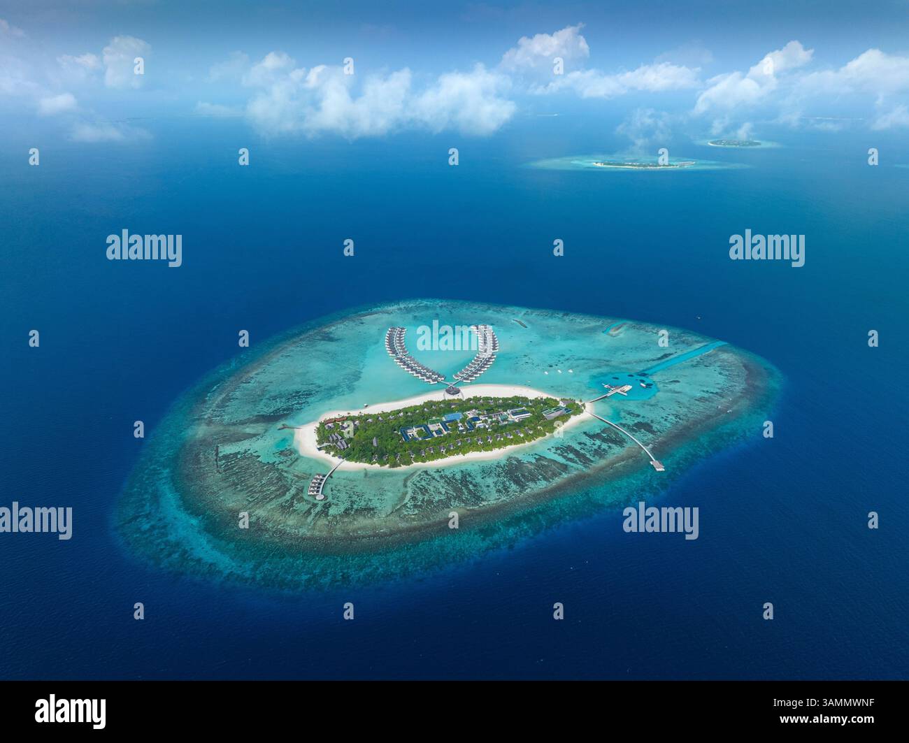 Aerial view of Kuredhivaru Island with luxury resort and beautiful ...