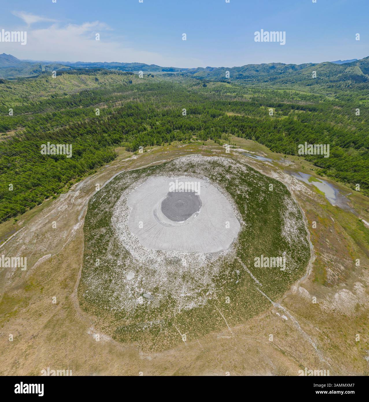 Aerial view of Sakhalin Island with volcanic craters and lush green ...