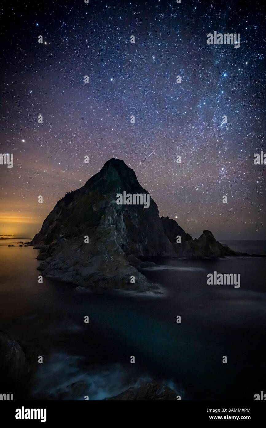 Aerial view of Aniva lighthouse at starry night over Aniva, Sakhalin ...