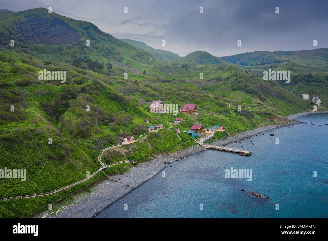Aerial view of Moneron island with greenery and boats, Moneron Island ...