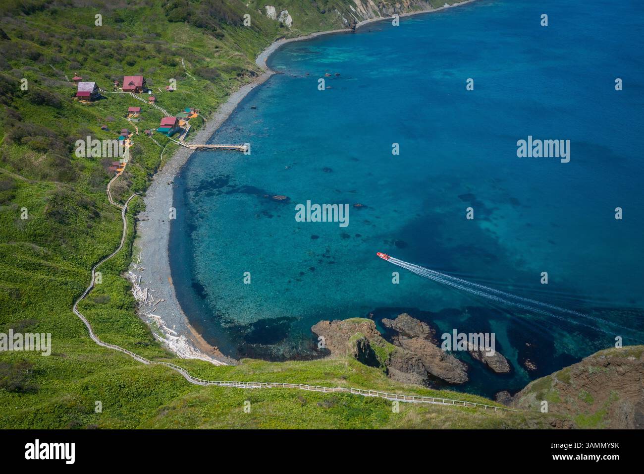 Aerial view of Moneron island in turquoise water with beautiful coastal ...