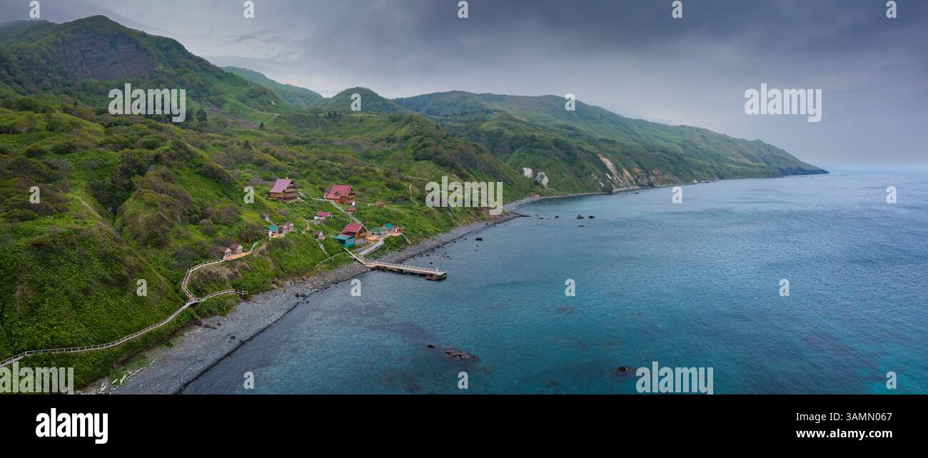 Aerial panoramic view of houses and small village on Ostrov Moneron ...