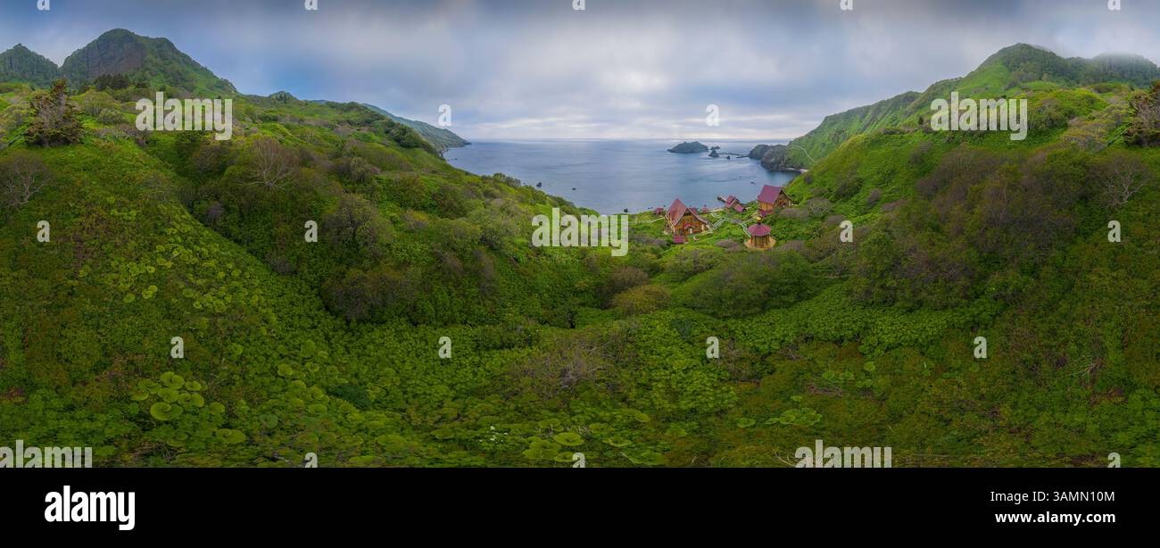 Aerial panoramic view of houses and small village on Ostrov Moneron ...