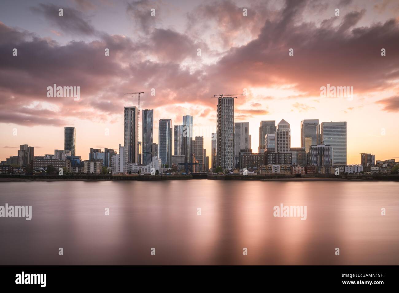 Canary Wharf at sunset, shot from the Greenwich Peninsula Stock Photo ...