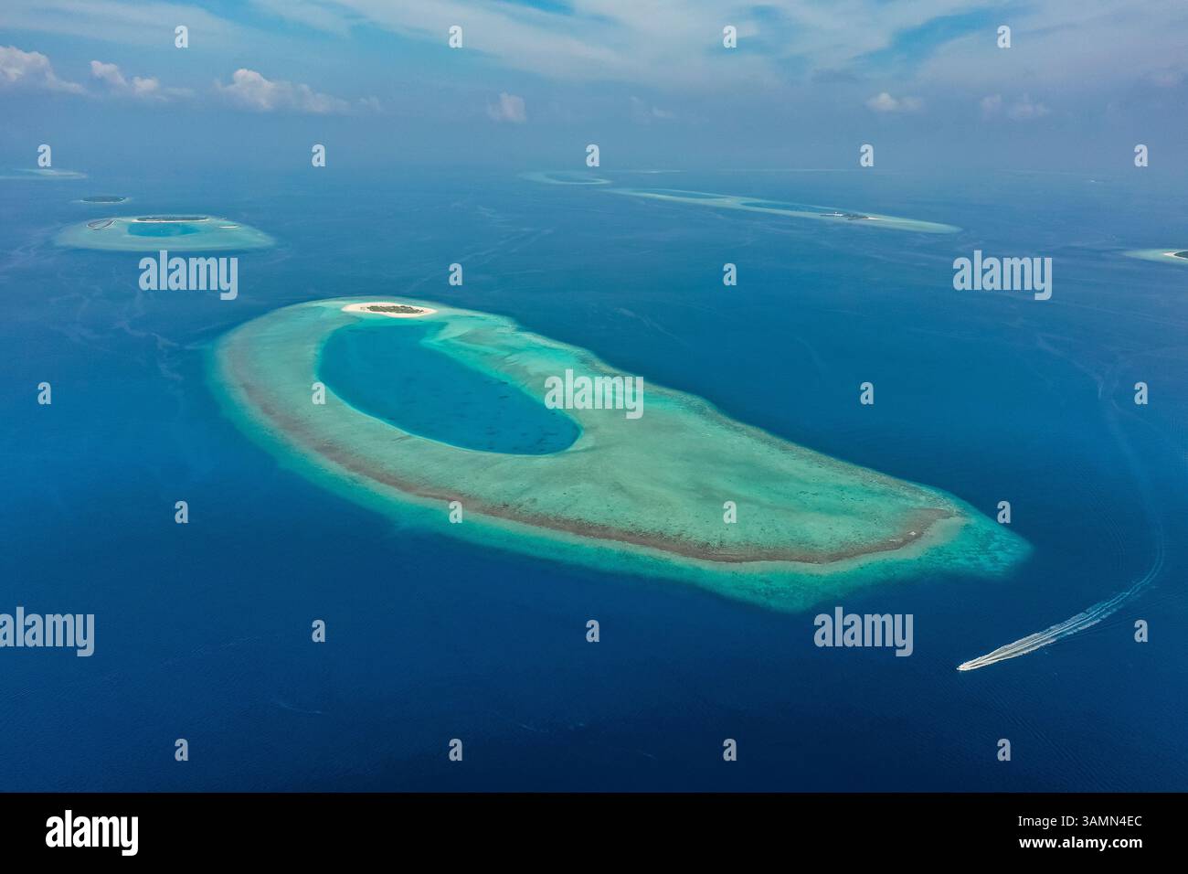 Aerial view of a sailing boat along the Raa Atoll coastline, Maldives archipelagos Stock Photo ...