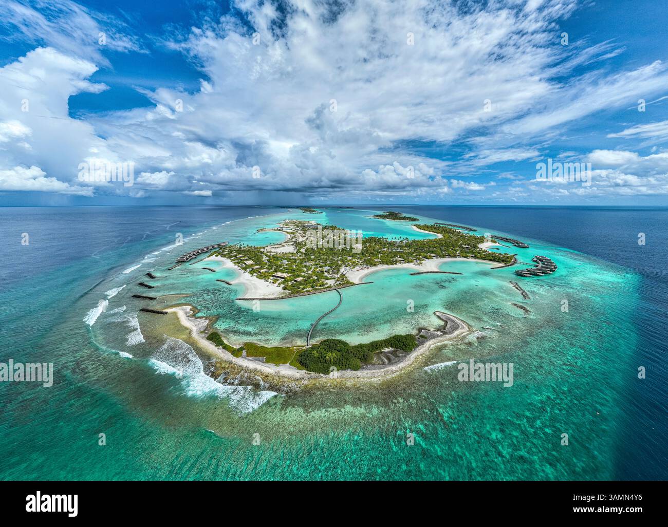 Aerial view of a luxury resort on Helengeli Island, Maldives ...
