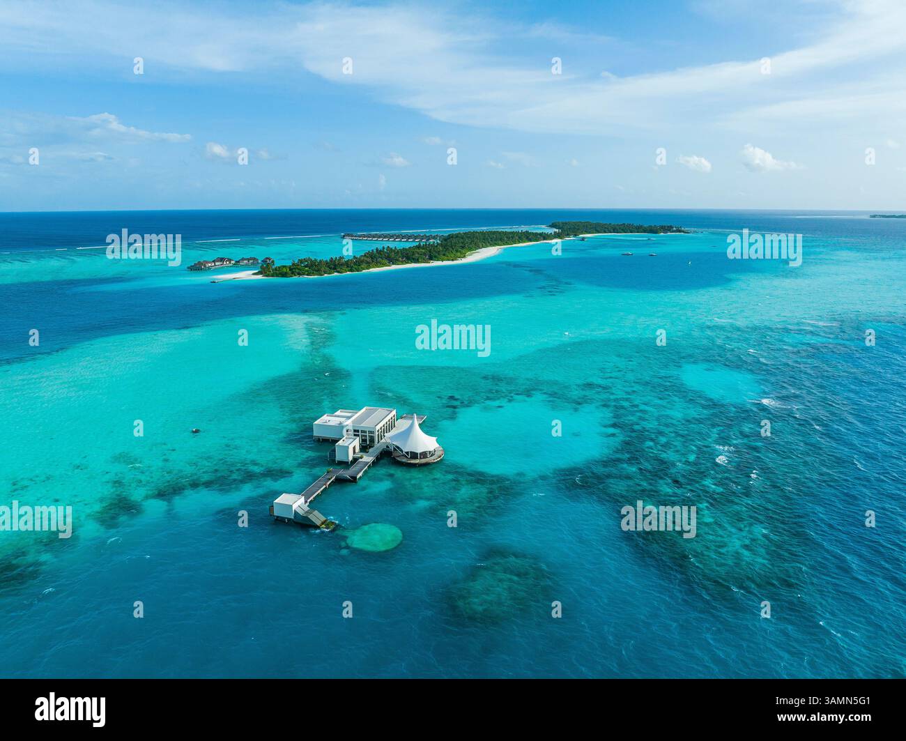 Aerial view of a building on the reef on Huluwalu Island, Maldives ...
