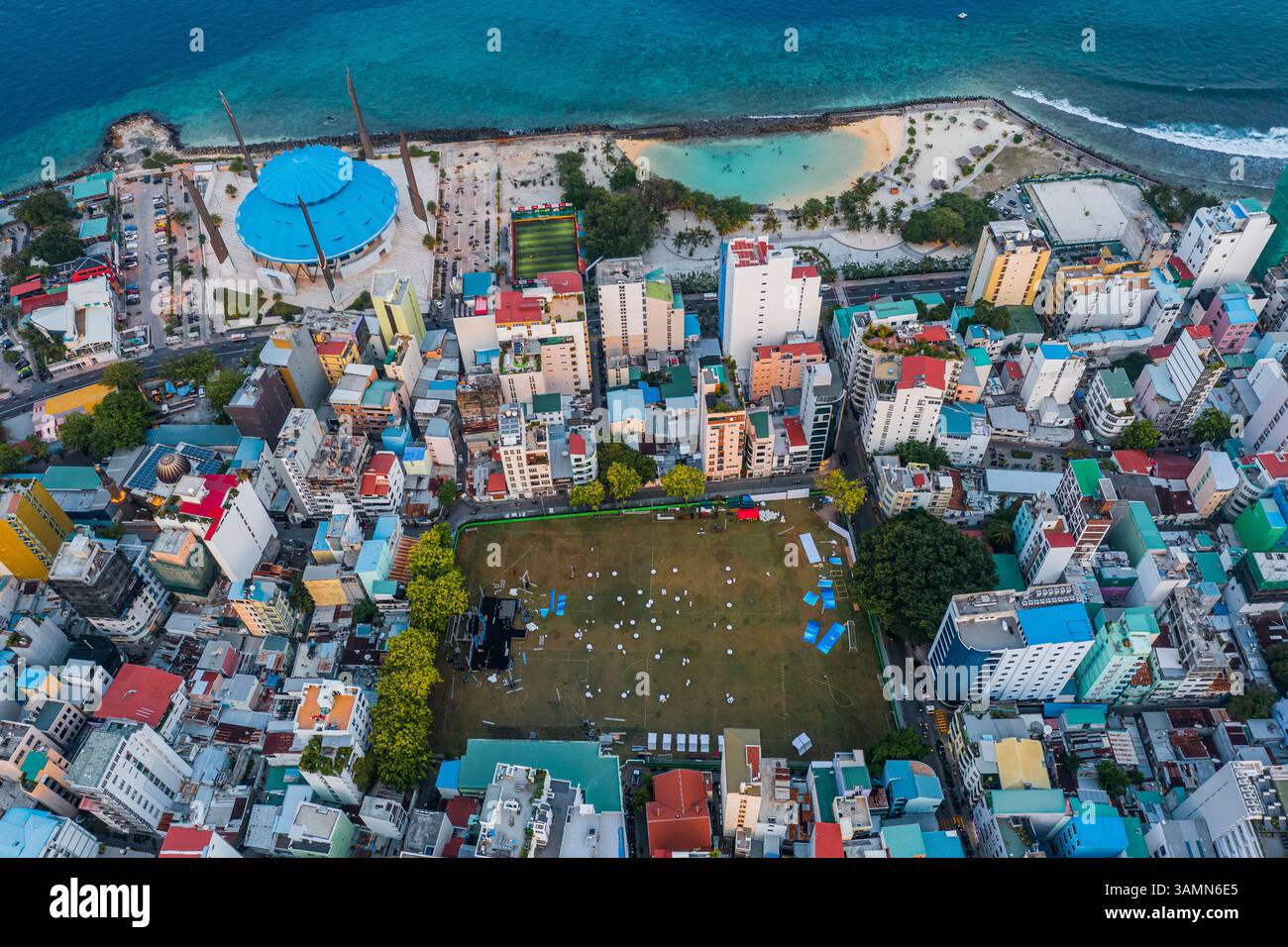 Aerial view of a sport field among the buildings in Malè town, Maldives ...