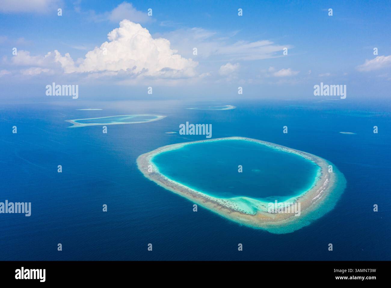 Aerial view of a few Atolls surrounded by the Indian Ocean, Maldives ...