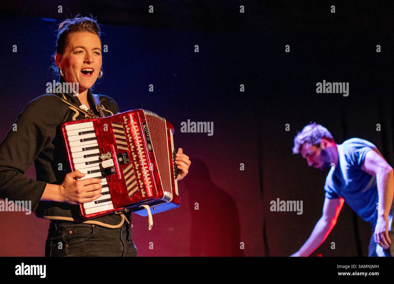 Performing in a variety show at the Slate Barn Sweffling a young woman ...