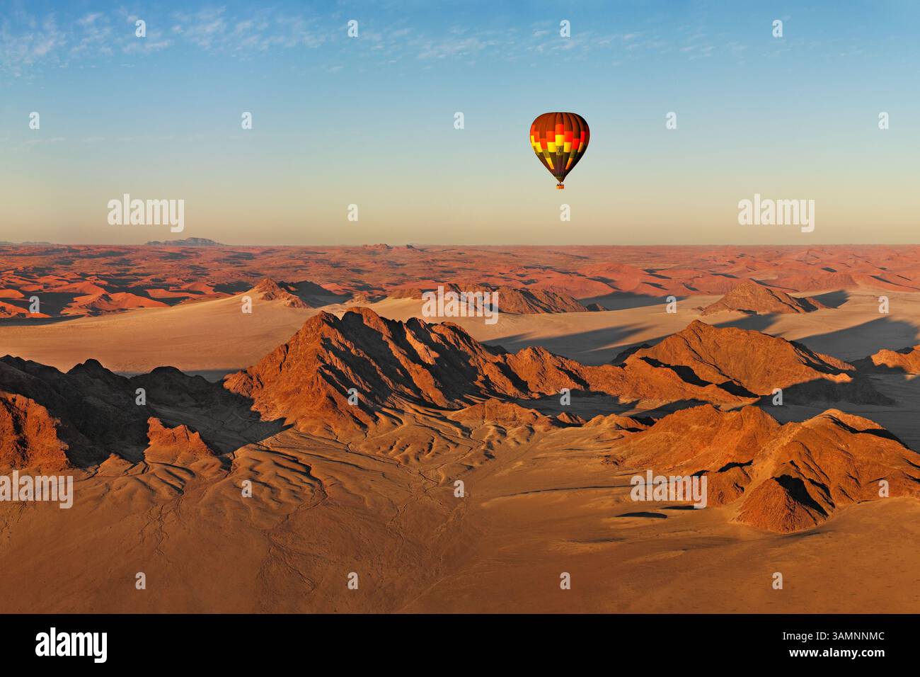 Aerial view of hot air balloon flying over Namibia desert Stock Photo ...