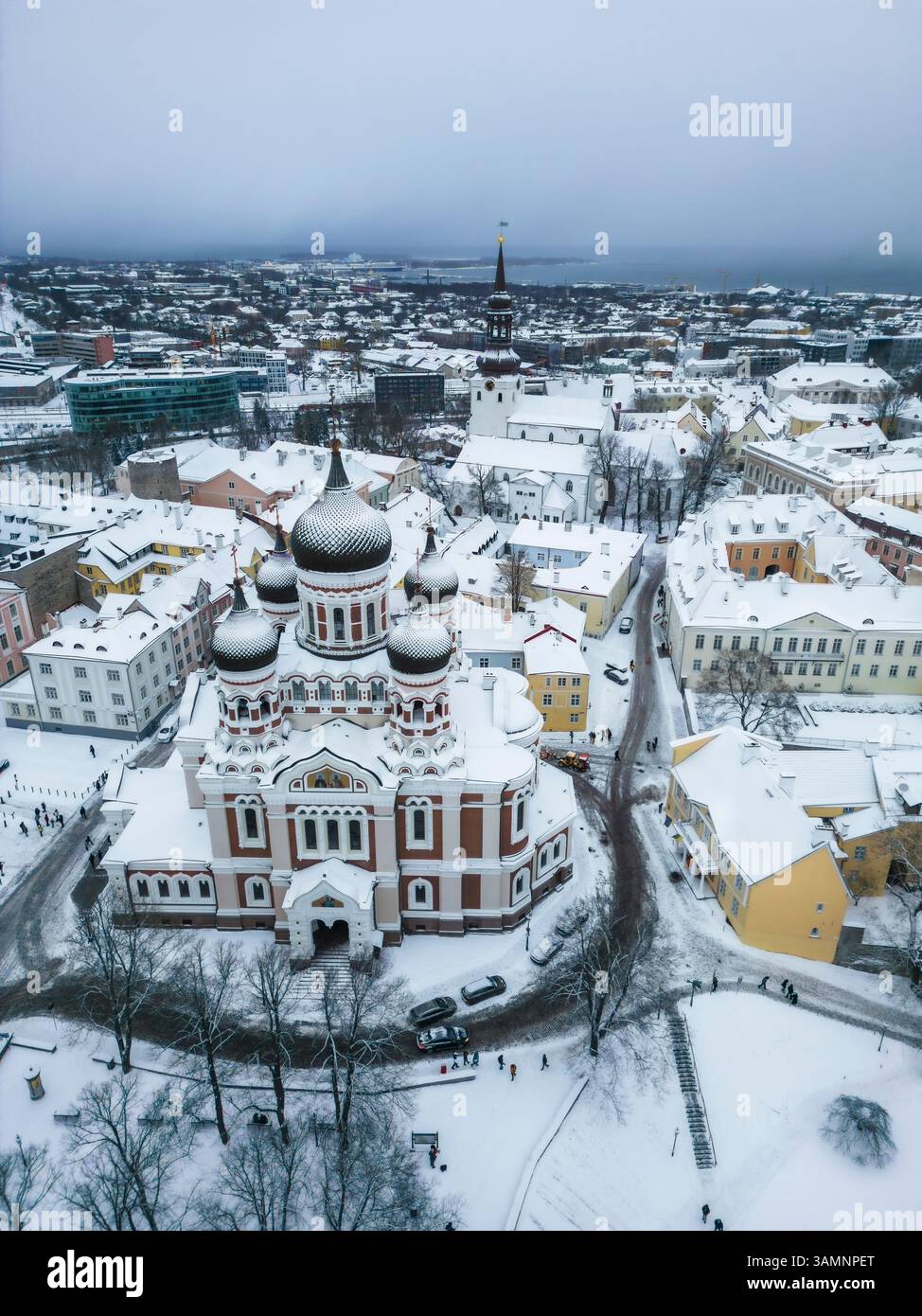 Aerial view of snowy old town with historic architecture and the ...
