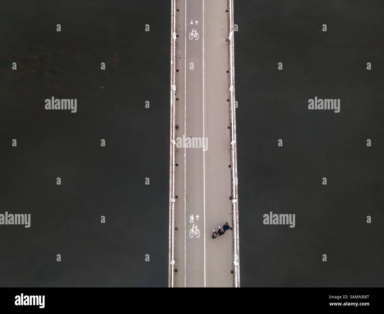 Aerial view of baltasis tiltas bridge over the serene neris river with ...