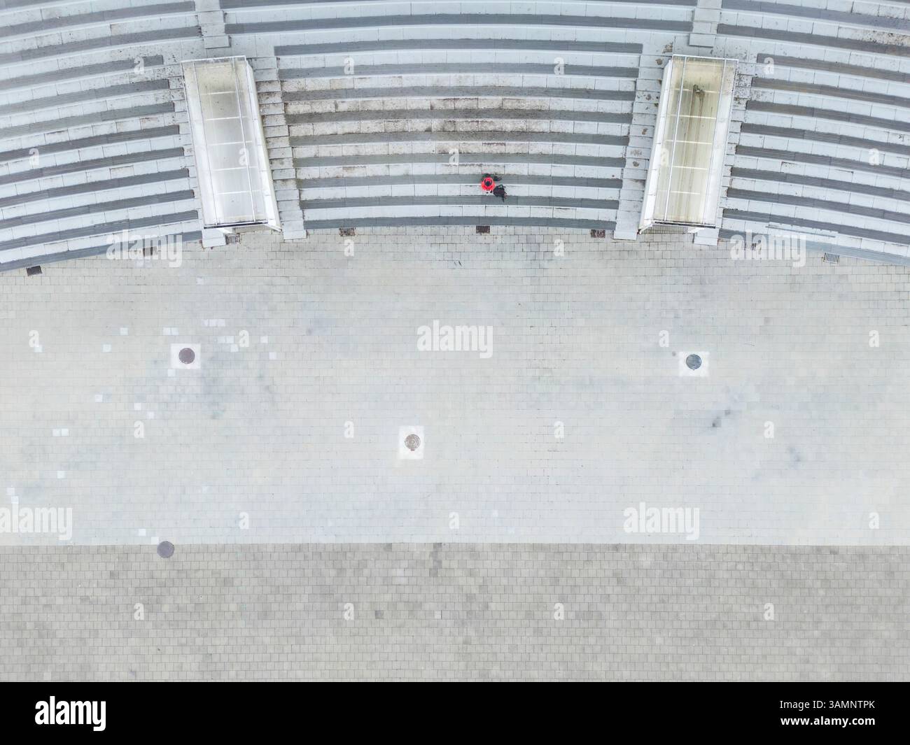 Aerial view of minimalist urban design featuring stairs and pavement ...