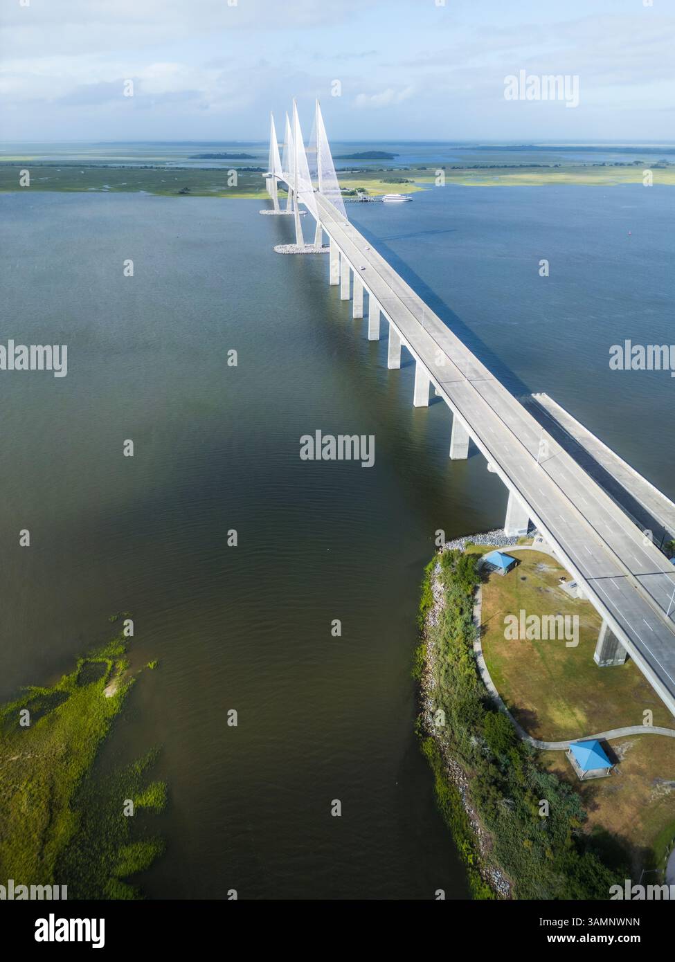 Aerial view of a scenic suspension bridge spanning the Turtle River ...