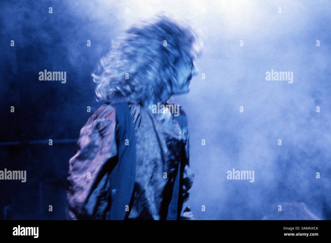 Robert Plant playing at the Hammersmith Odeon, London in the late 1980s ...