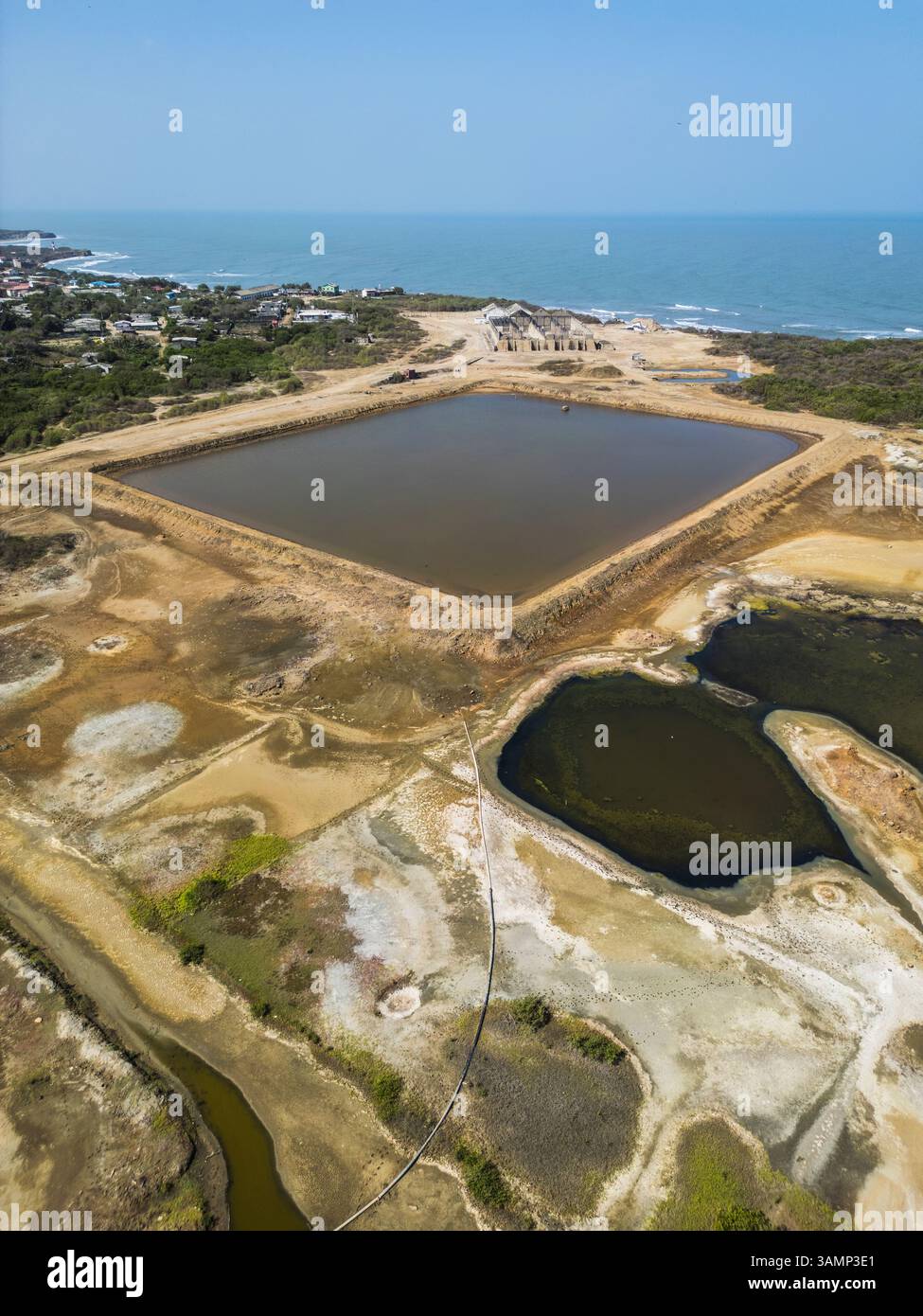 Aerial view of salt lakes and village by the sea, Santa Catalina ...