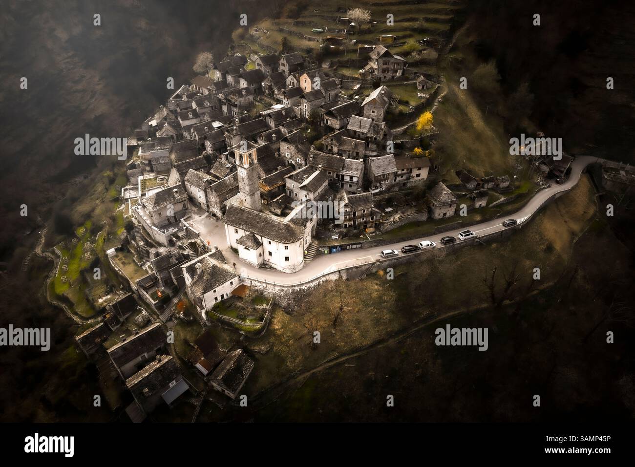 Aerial view of quaint Swiss village with charming church and ...