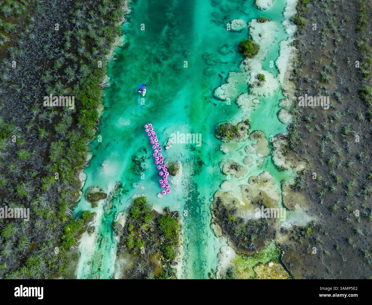 Aerial view of natural lagoon with inflatable swimming ring, Othon P ...