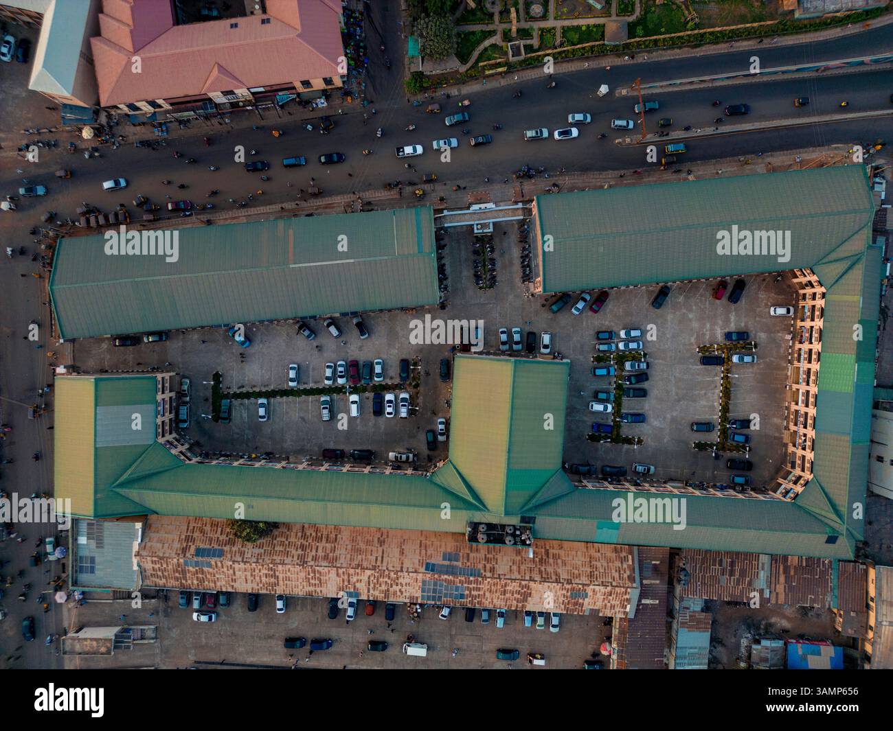 Aerial view of bustling Mangal Plaza with commercial buildings and busy ...