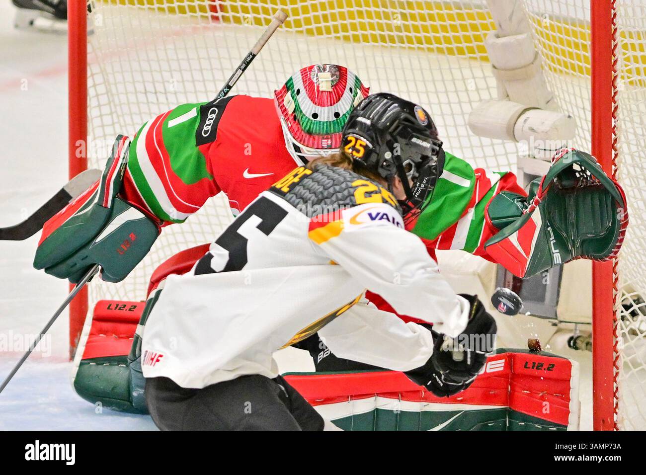 L-R Goalkeeper Aniko Nemeth (HUN) and Laura Kluge (GER) in action ...