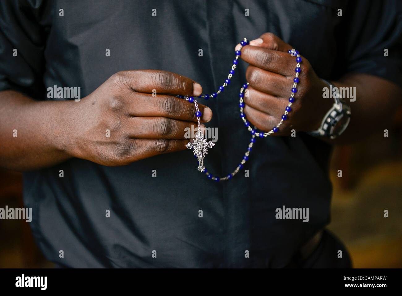 UGANDA, Kampala, National Seminary Ggaba, priest with rosary necklace ...