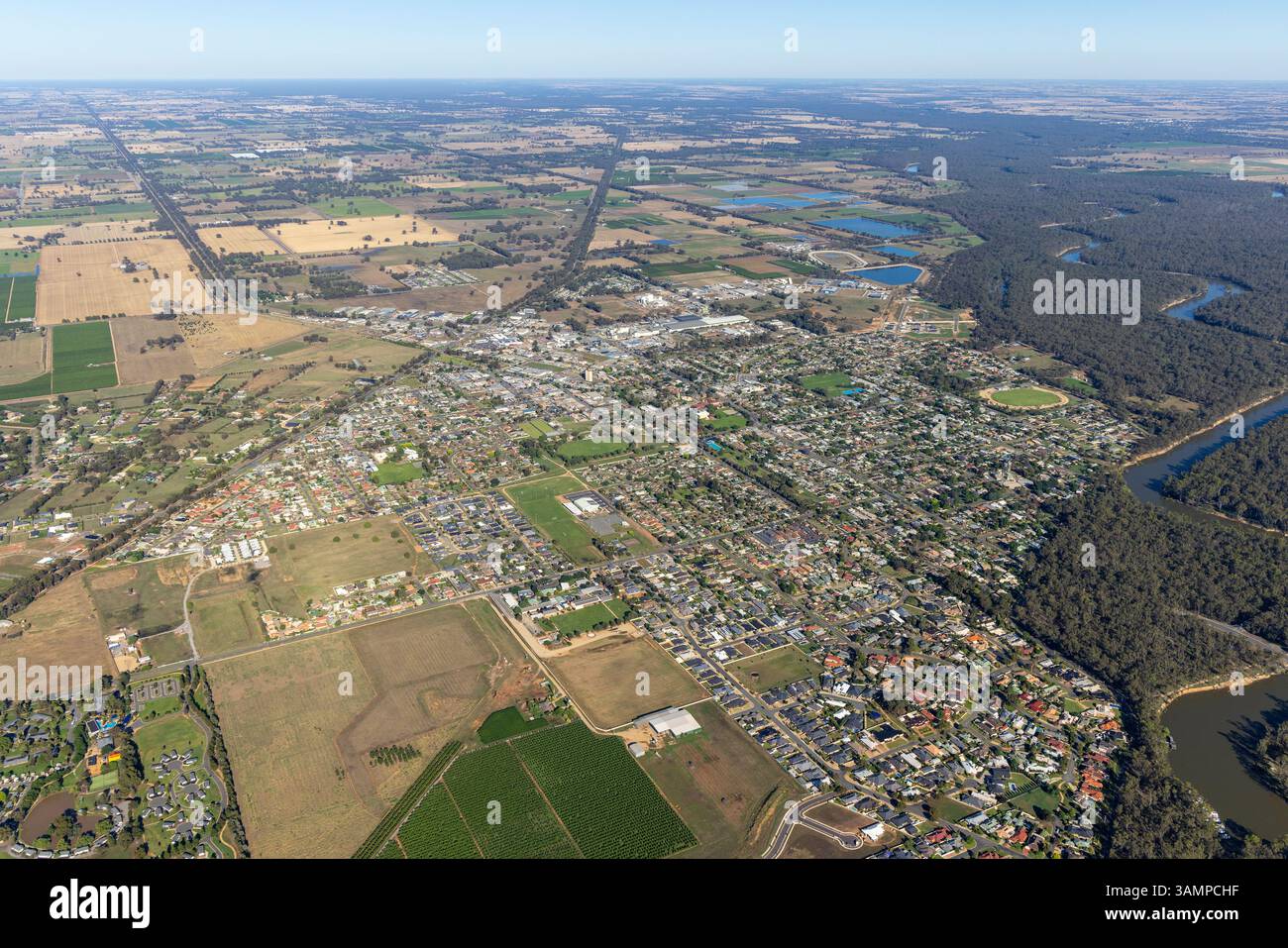 Aerial view of the expansive countryside with fields, homes, and a ...