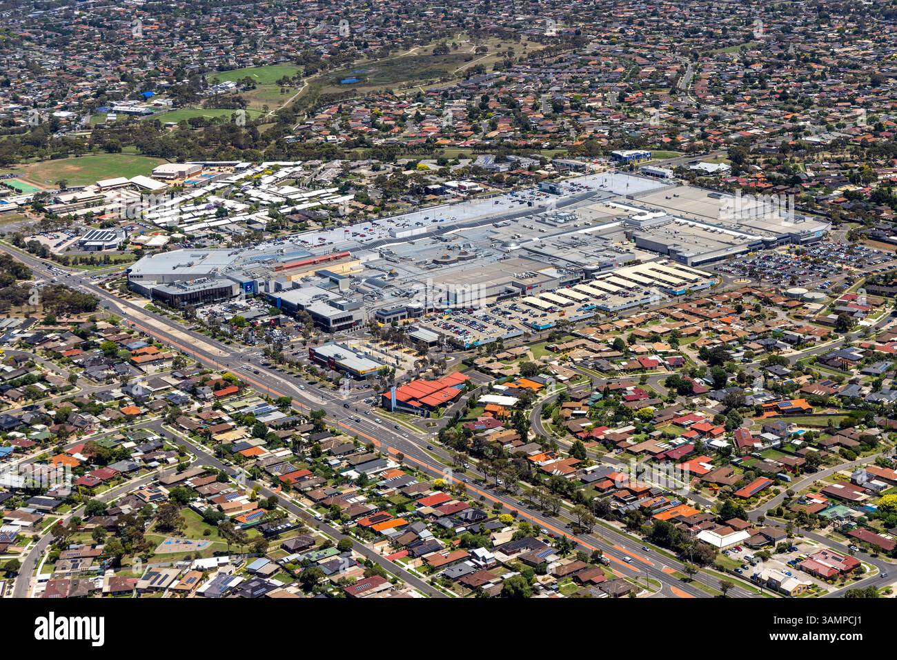 Aerial view of urban landscape with residential areas and shopping ...