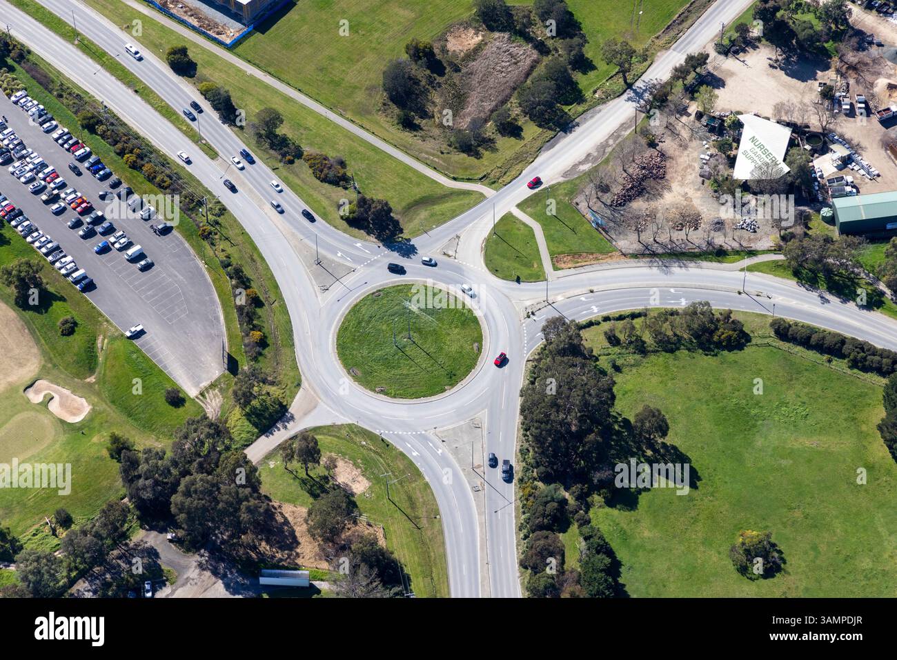 Aerial view of a beautiful urban landscape featuring a roundabout and ...