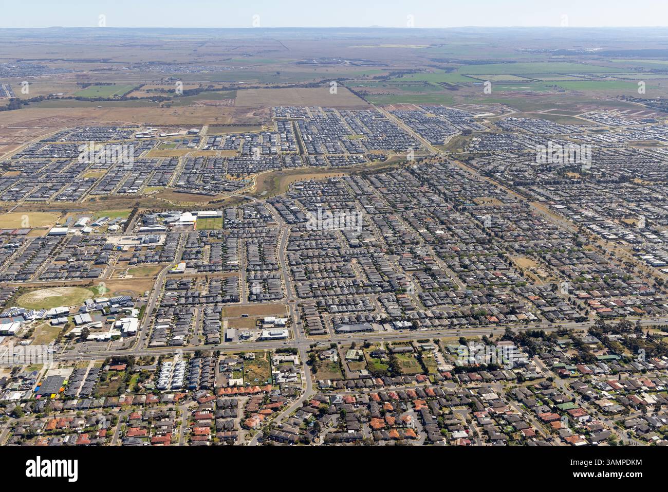 Aerial view of suburban residential district with homes and roads ...