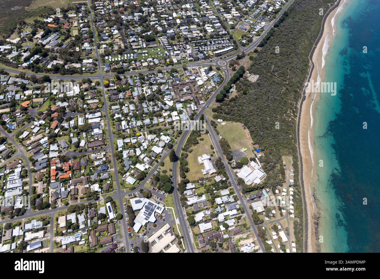 Aerial view of beautiful coastal town with ocean and beach, Point ...