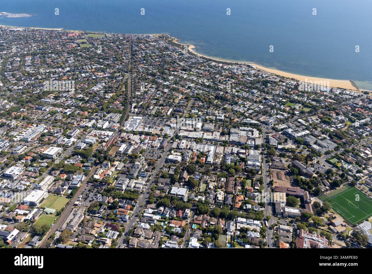 Aerial view of beautiful Brighton beach with coastal homes and ocean ...