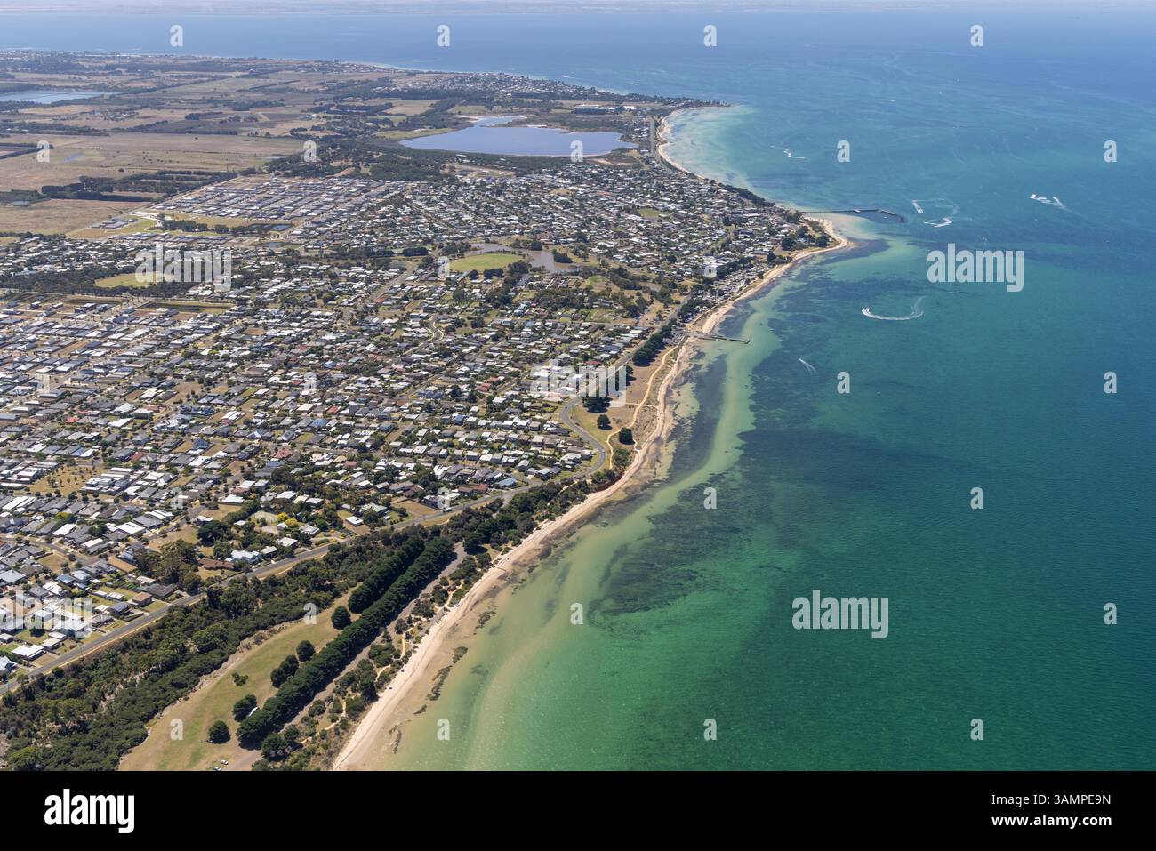 Aerial view of milly beach with coastal town and ocean, St Leonards ...