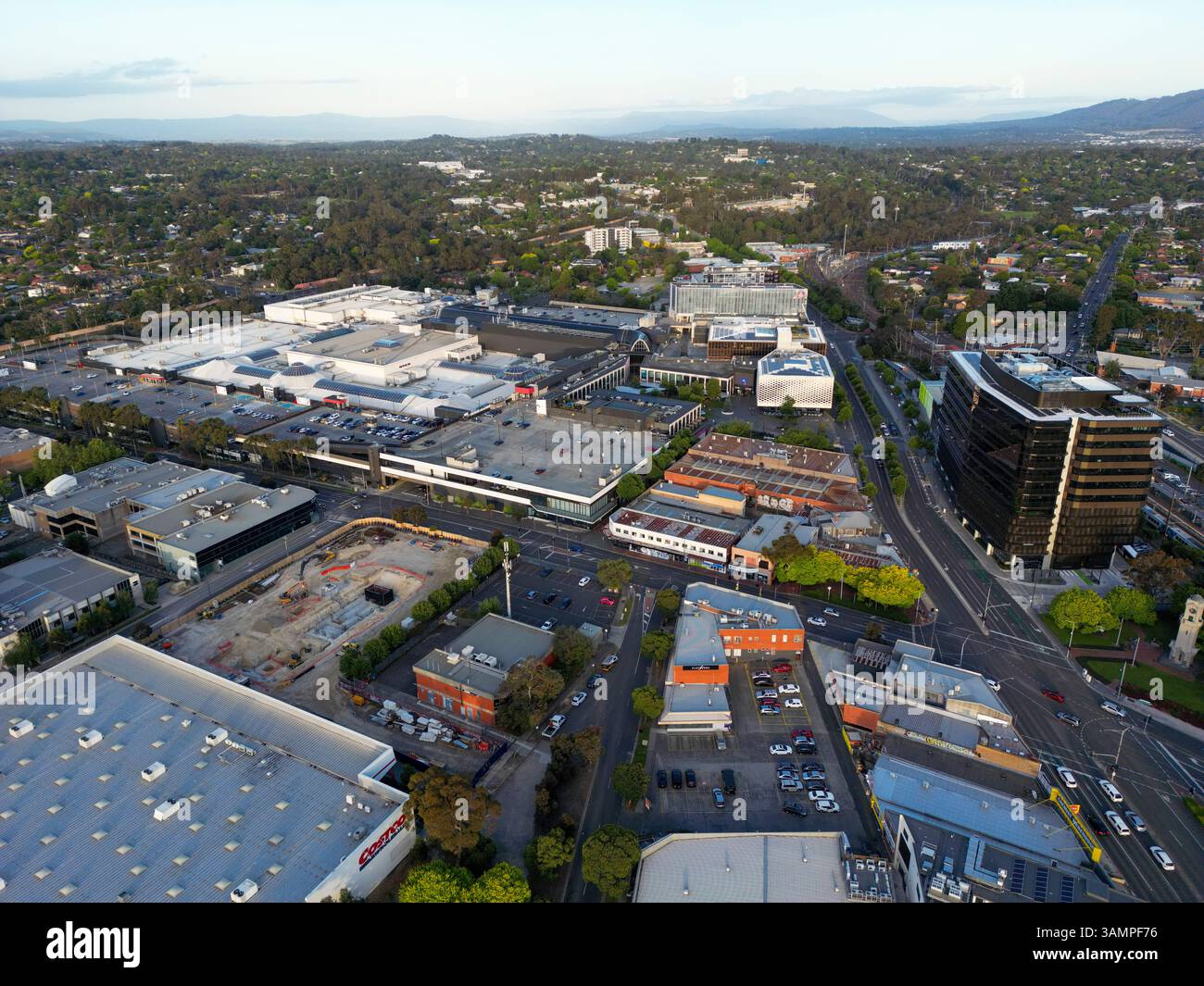 Aerial view of urban landscape featuring commercial areas and ...