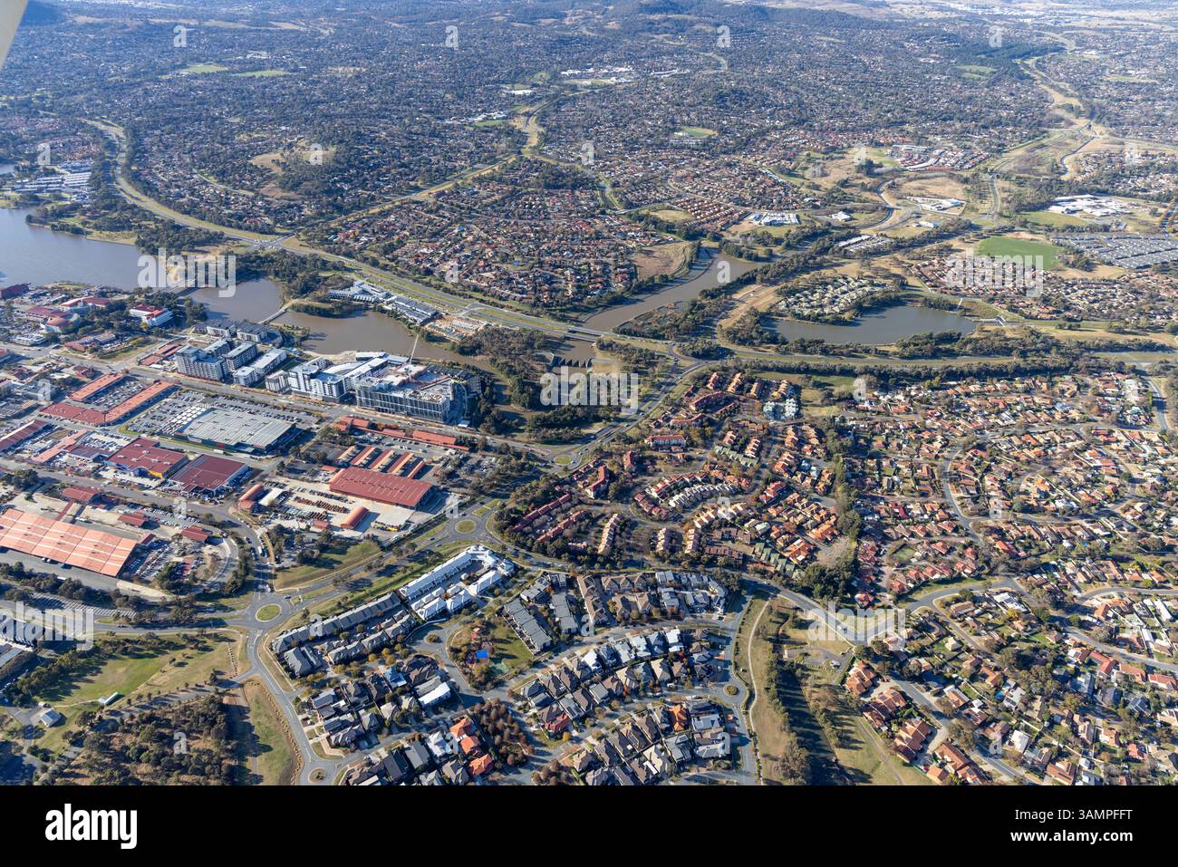Aerial view of urban landscape with residential houses and roads ...
