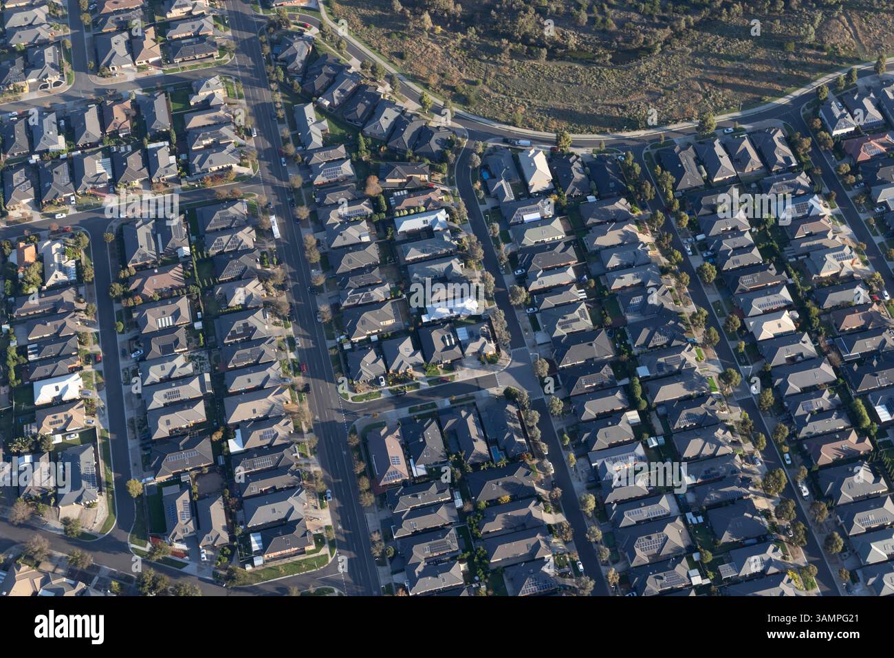 Aerial view of organized suburban neighborhood with modern homes and ...