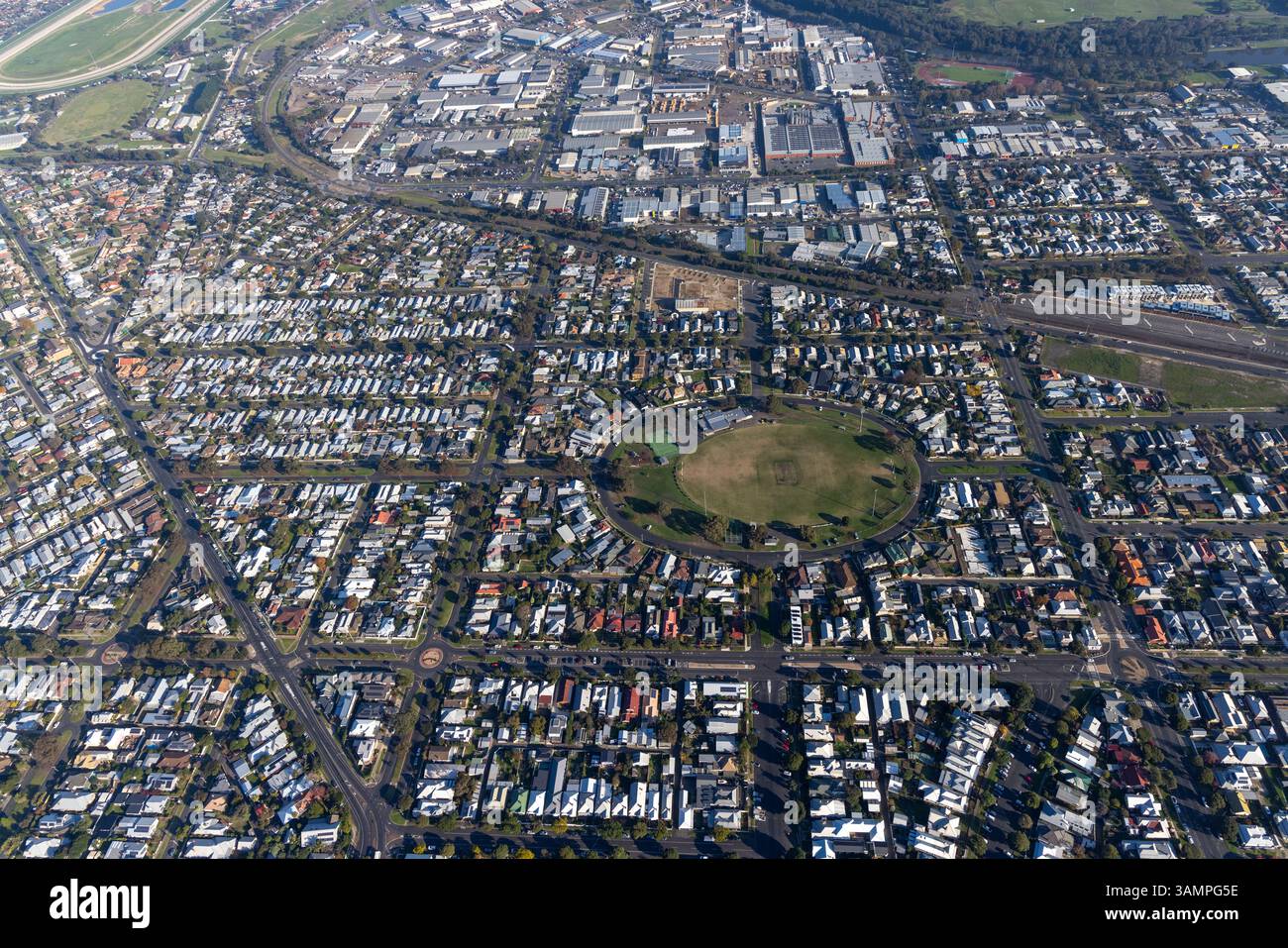 Aerial view of residential neighborhood with homes and green space ...