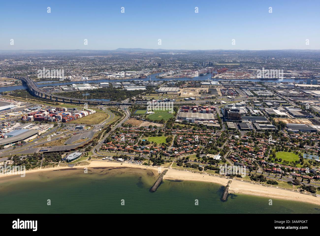 Aerial view of beautiful Port Melbourne with urban skyline, beach, and ...