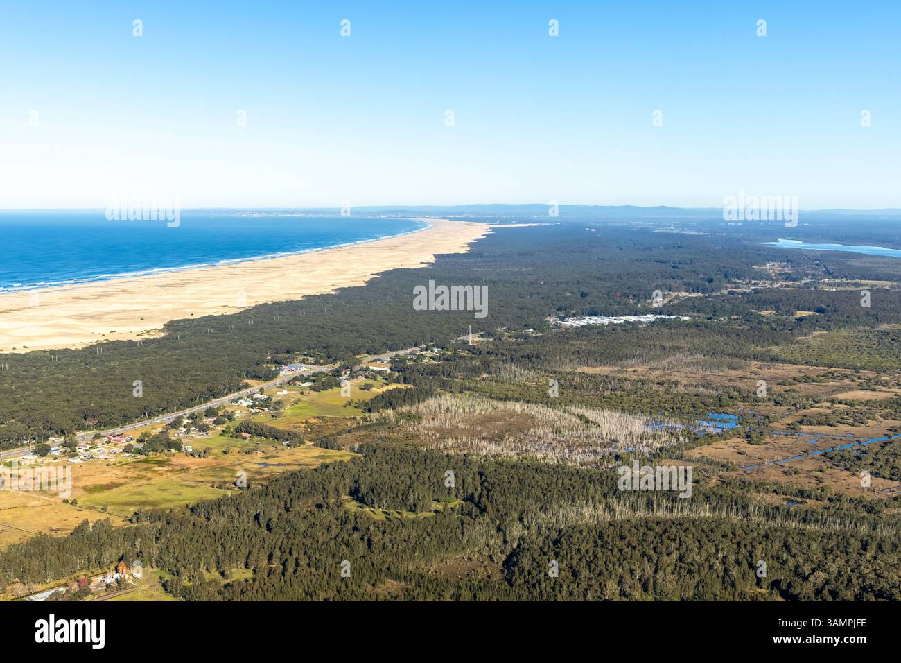Aerial view of Birubi Beach along the coastline at Worimi Regional Park ...