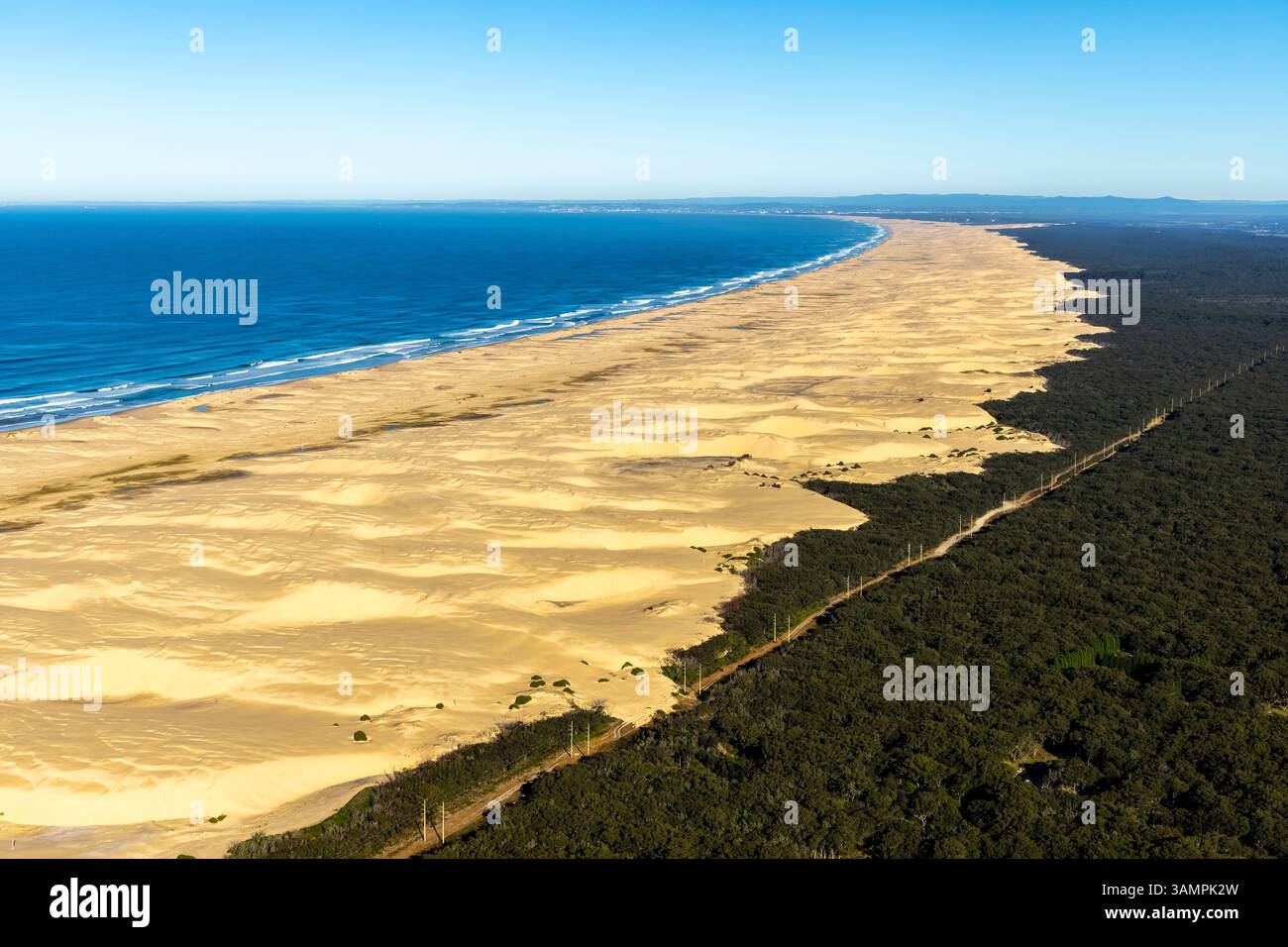 Aerial view of sand dunes along the coast at Worimi Regional Park ...