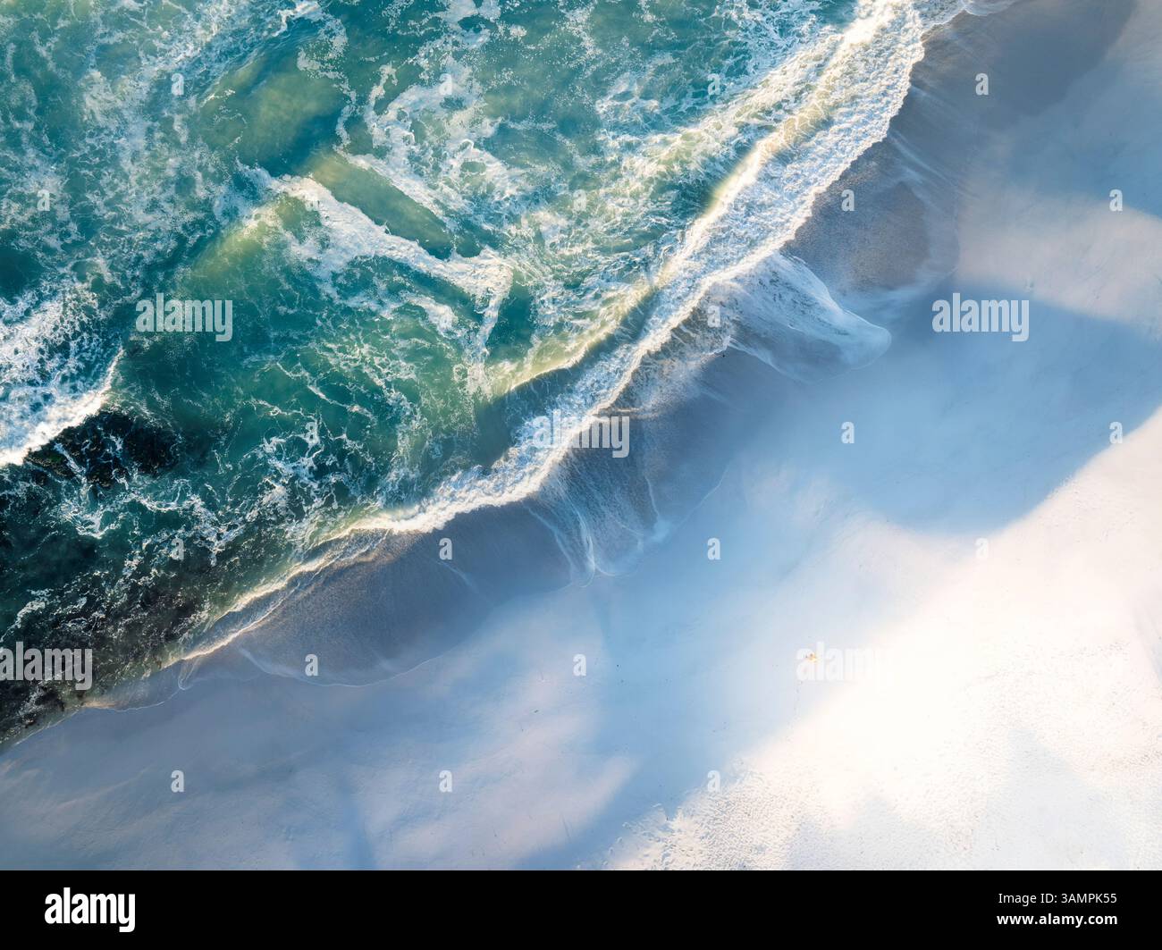 Aerial view of beautiful beach with white sand and waves, Melkbosstrand ...