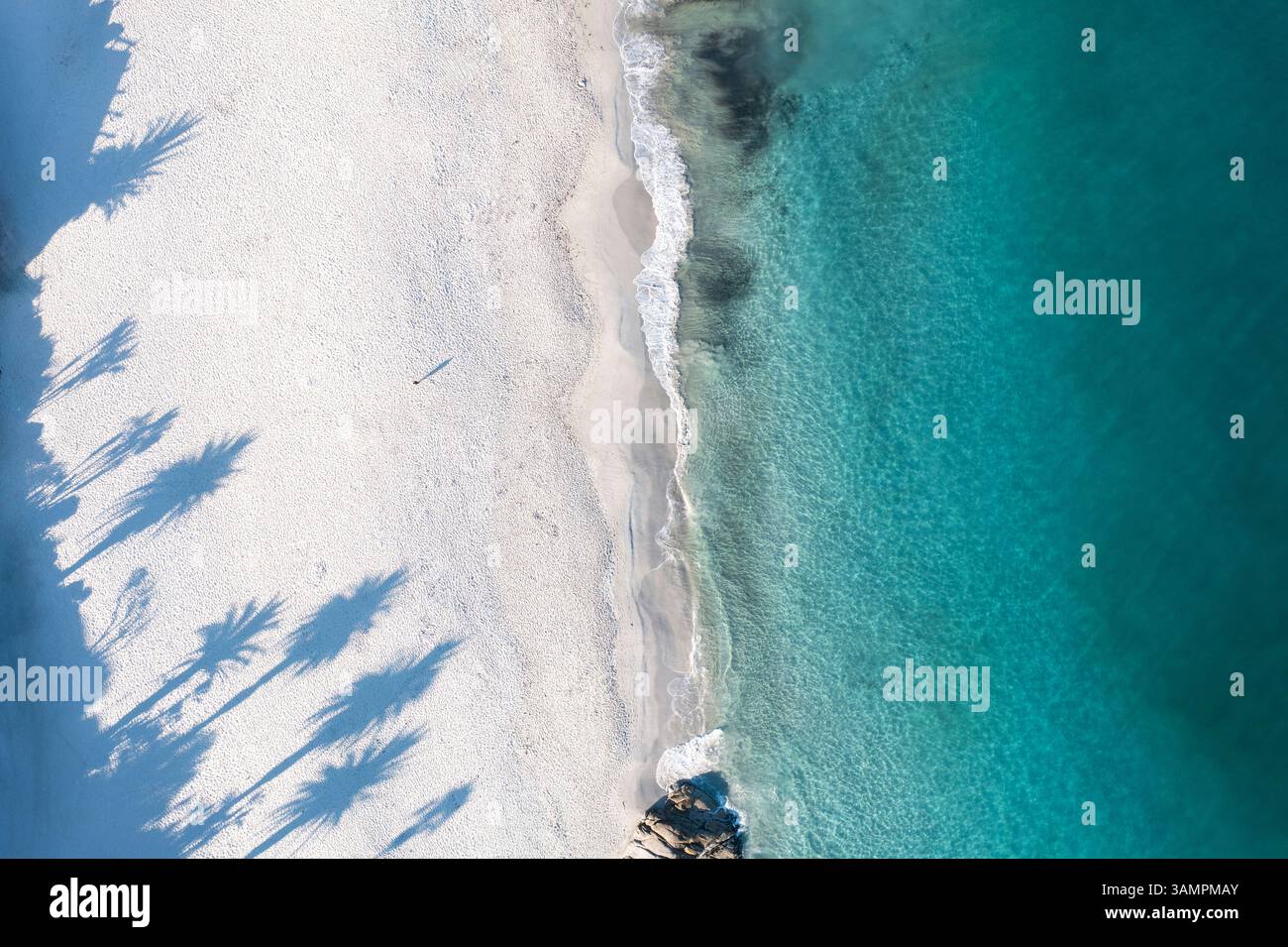 Aerial view of Clifton 4th beach with white sand, palm trees, and ...