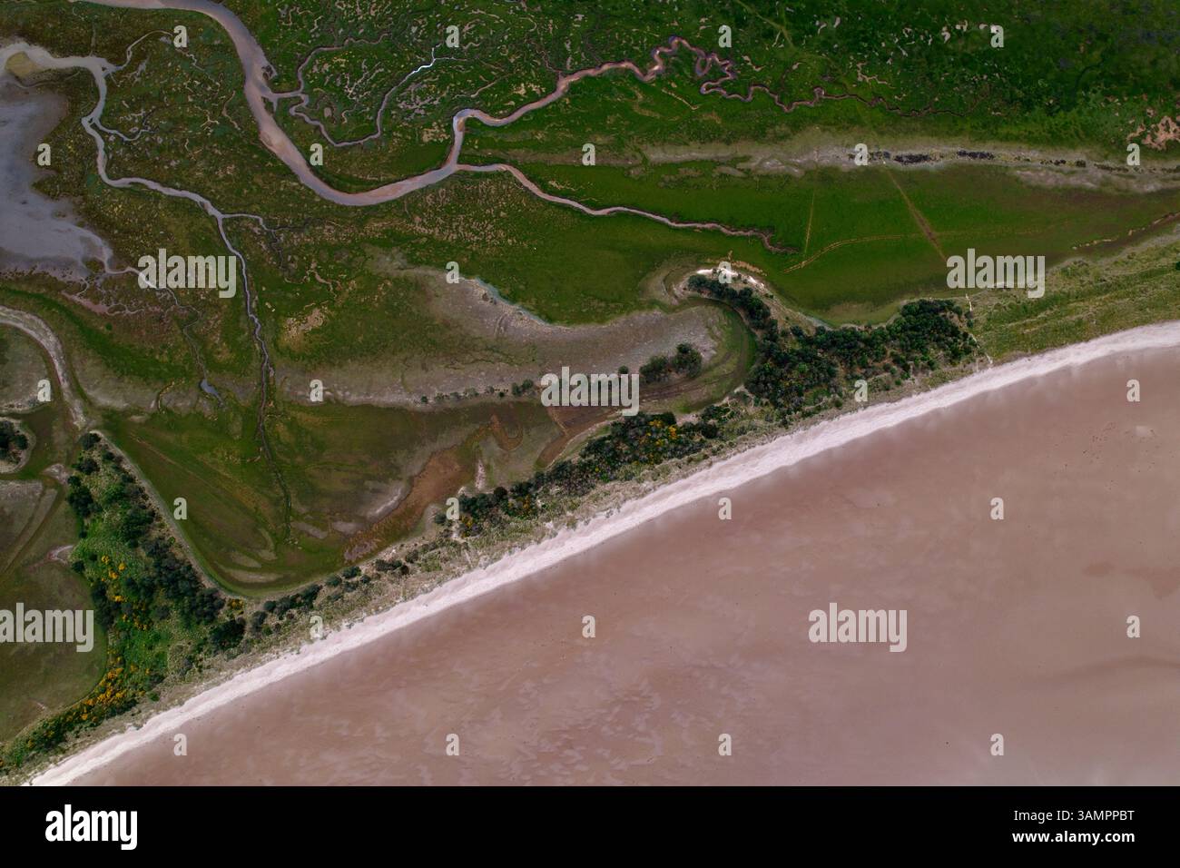 Aerial view of beautiful tidal patterns at Culbin Sands with serene ...
