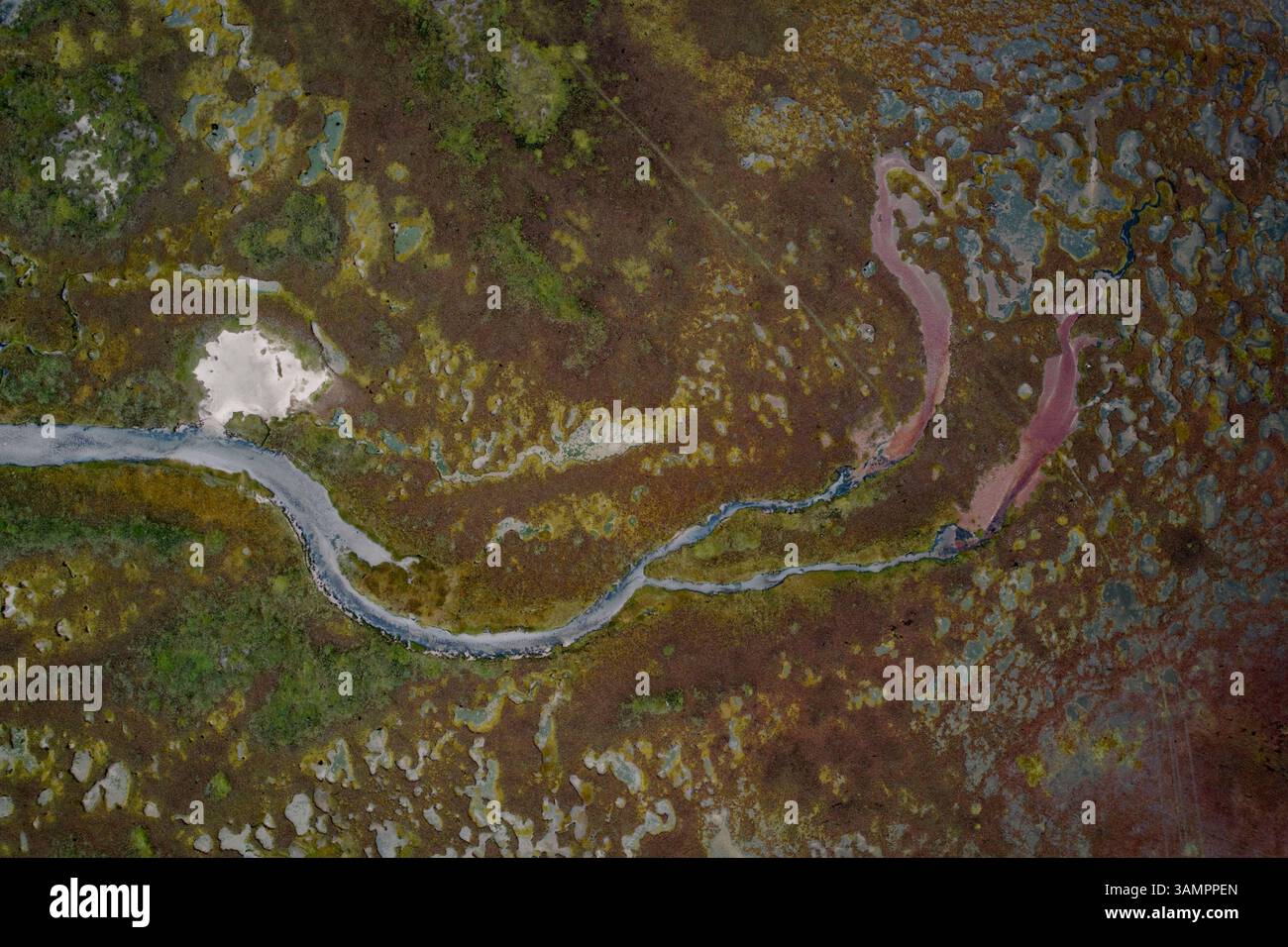 Aerial view of abstract tidal patterns in a beautiful landscape with a ...