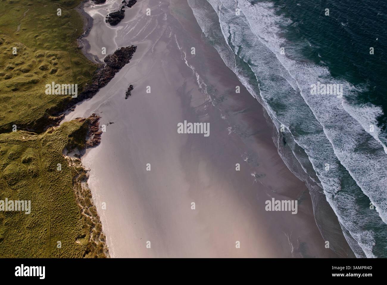 Aerial view of breaking waves on a beautiful sandy beach, Isle of Tiree ...