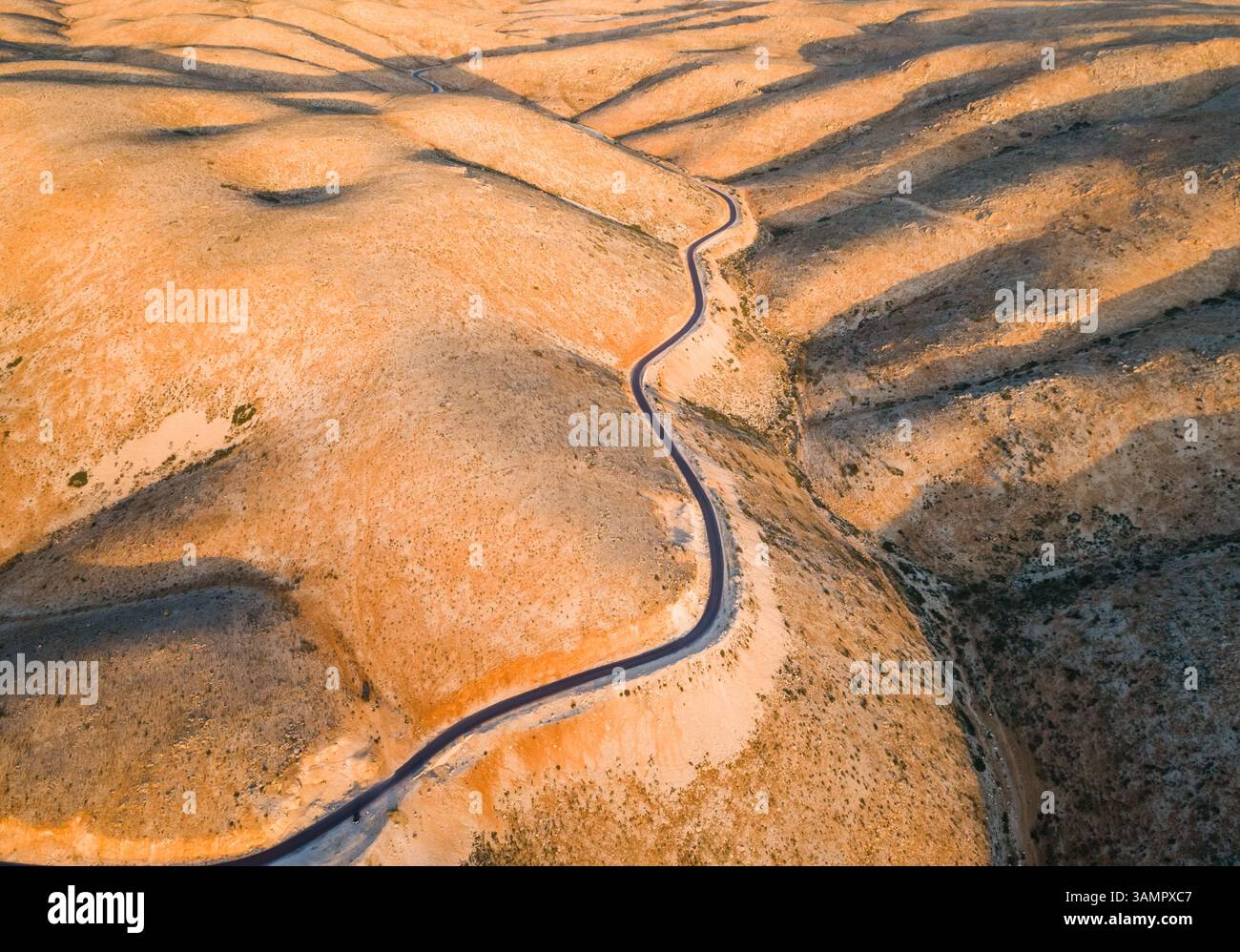 Aerial view of an empty road in Ras Baalbek semi-desert in Lebanon ...