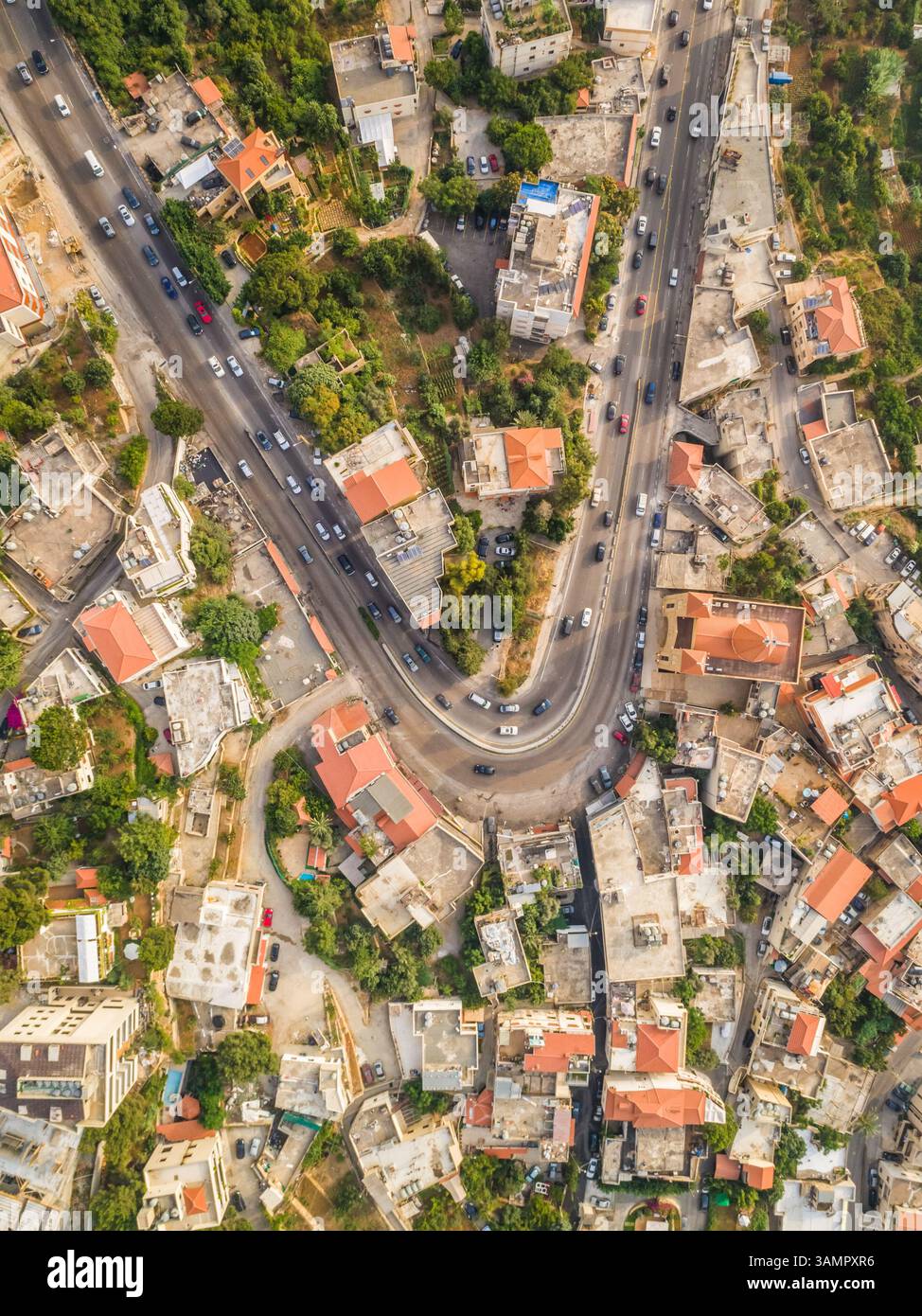 Aerial view of a curved road in the picturesque village of Aley in ...